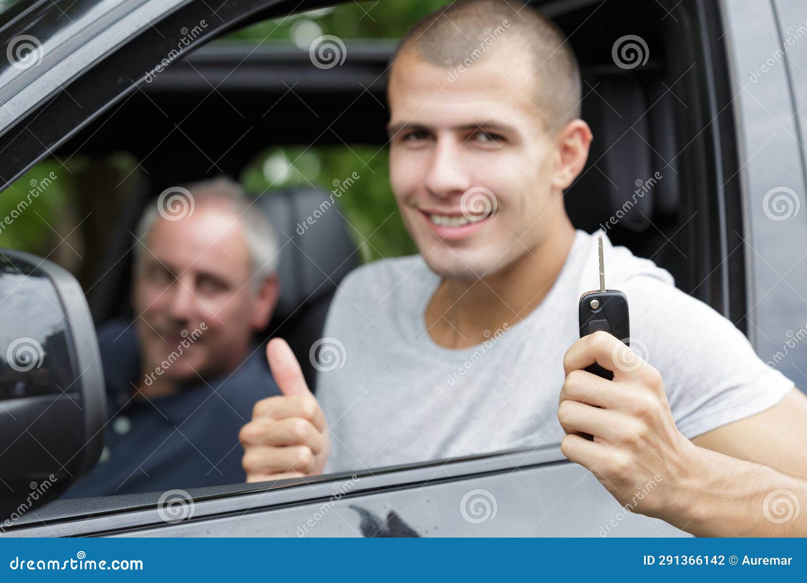 Young man with keys to car stock photo. Image of passengers - 291366142