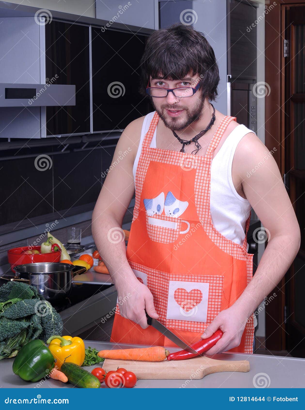 Young man in the kitchen stock photo. Image of happiness - 12814644