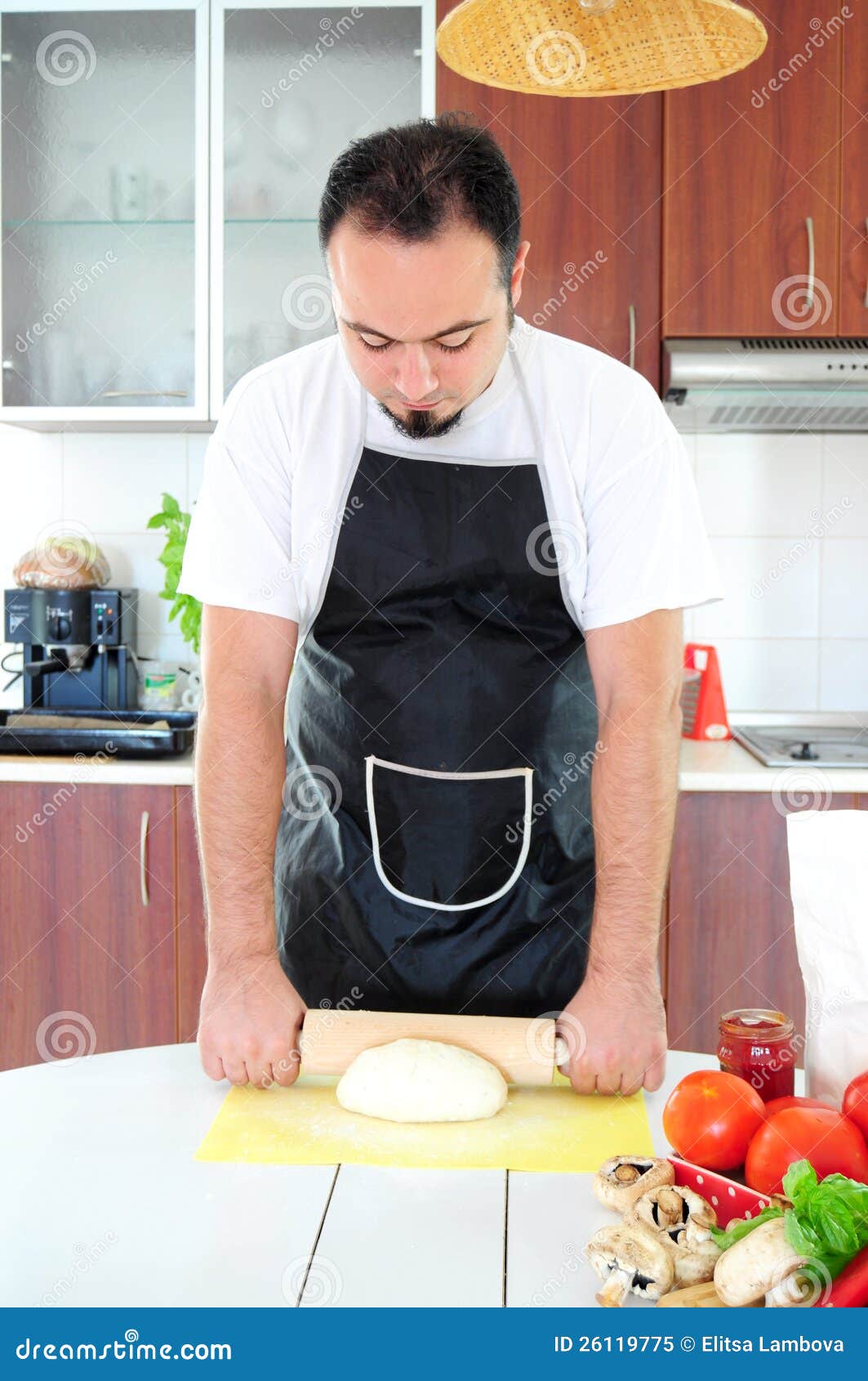 Young man in kitchen stock image. Image of handsome, cooking - 26119775