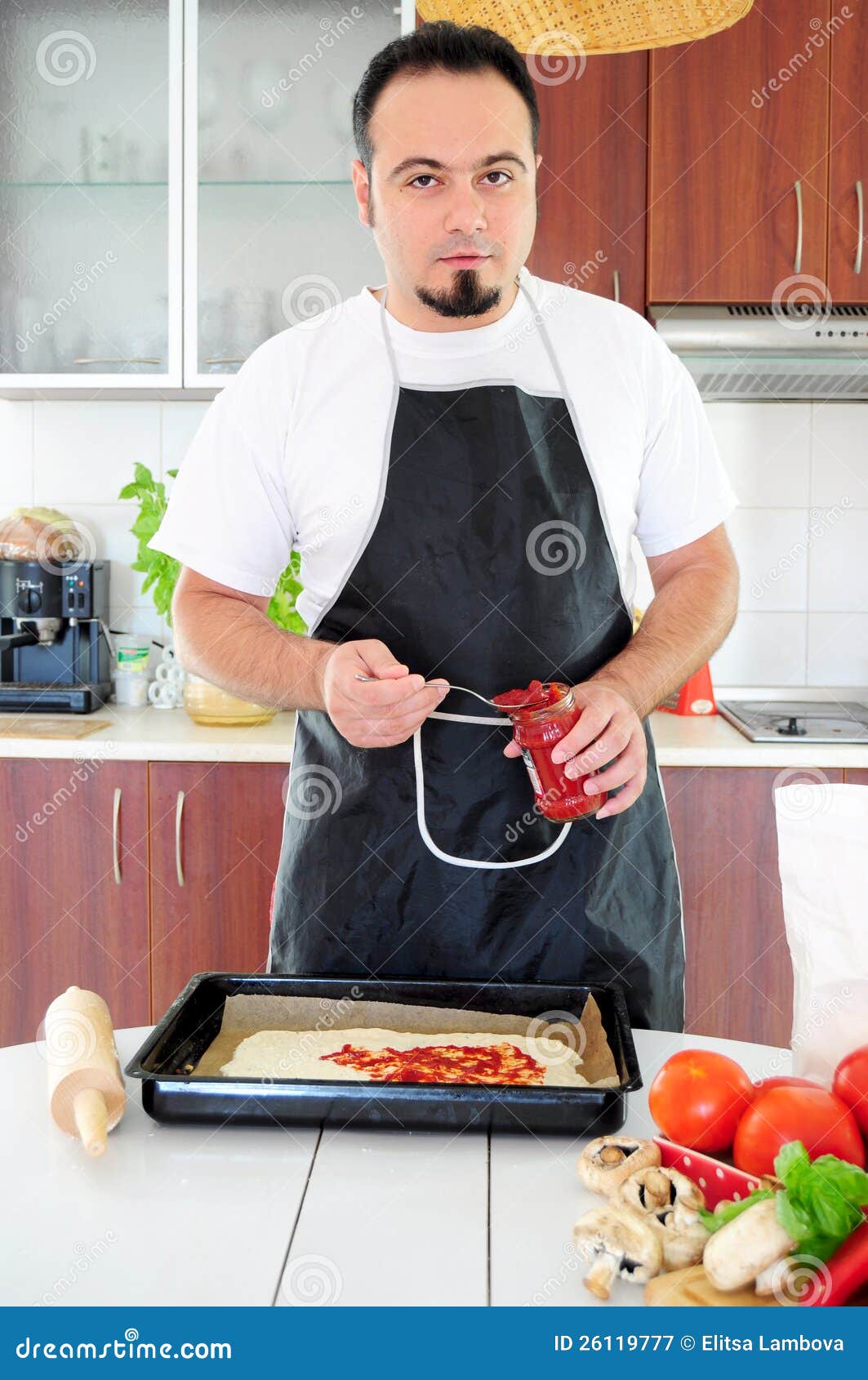 Young man in kitchen stock image. Image of adult, kitchen - 26119777