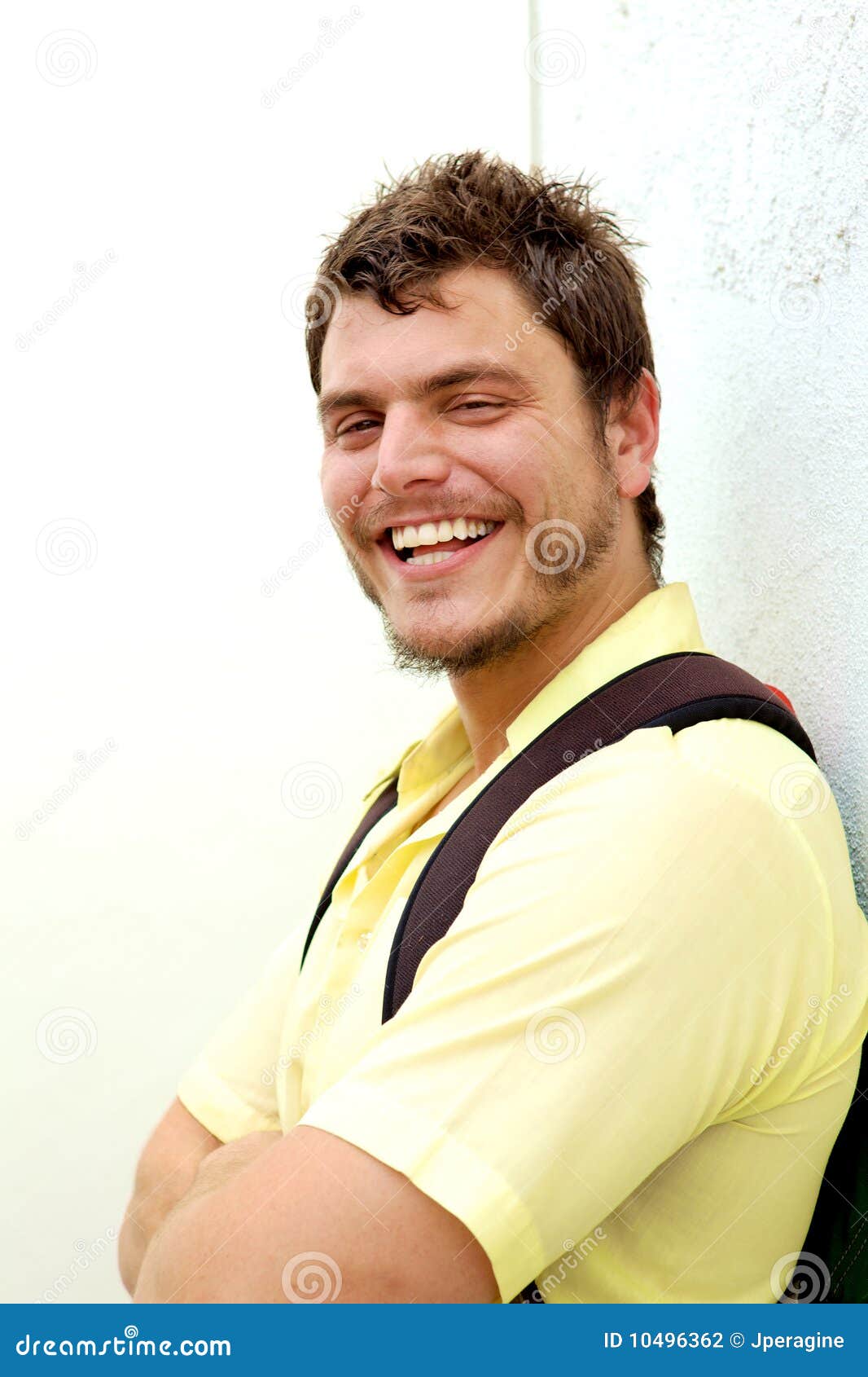 Young man with a knapsack stock photo. Image of action - 10496362