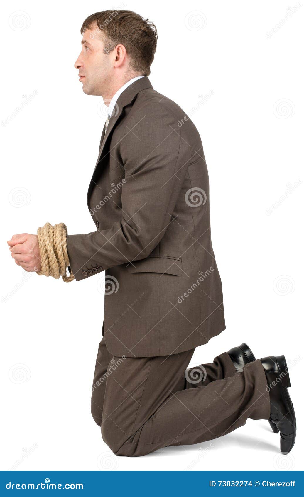 Young man kneeling stock photo. Image of isolated, white - 73032274