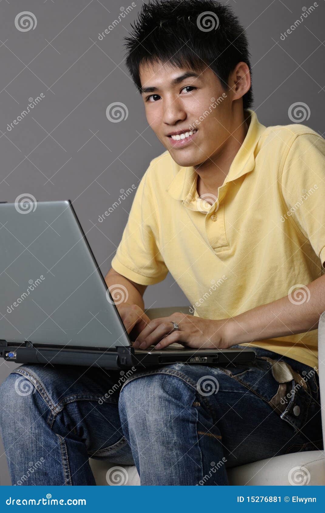 Young man with laptop stock image. Image of computer - 15276881