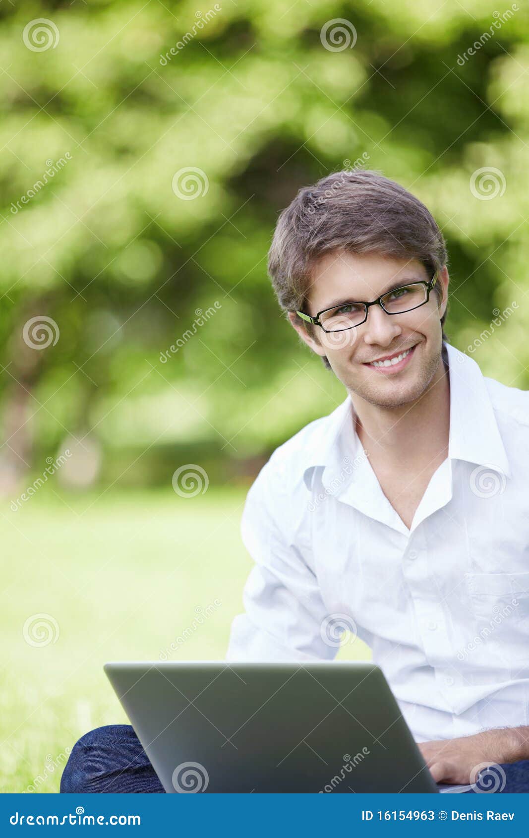Young man with laptop stock image. Image of cheerful - 16154963