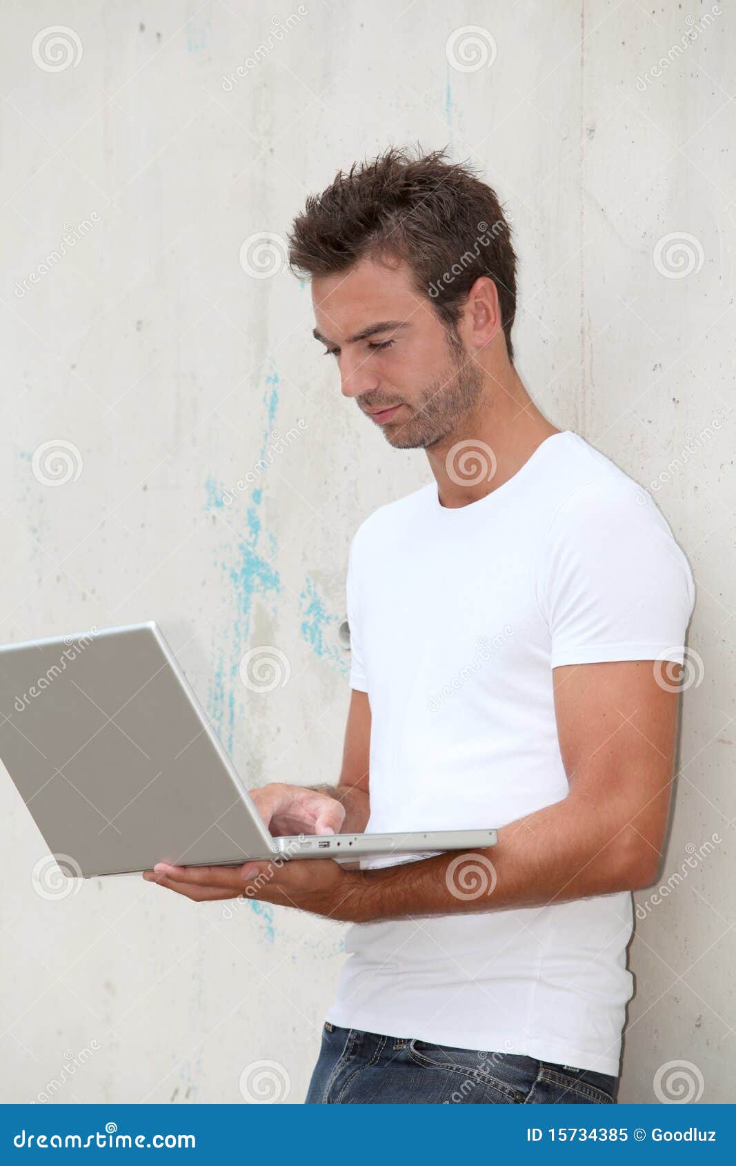 Young Man with Laptop Computer Stock Image - Image of smiling ...