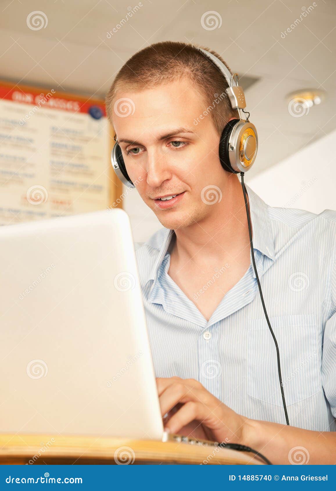 Young Man with Laptop and Headphones Stock Photo - Image of camera ...
