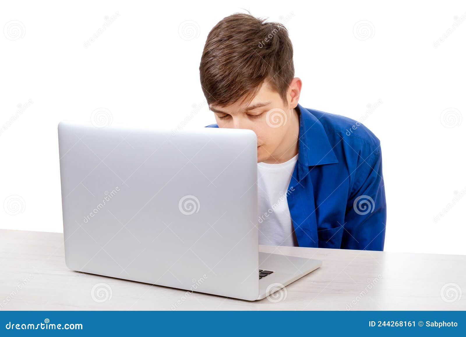 Young Man with Laptop stock image. Image of handsome - 244268161