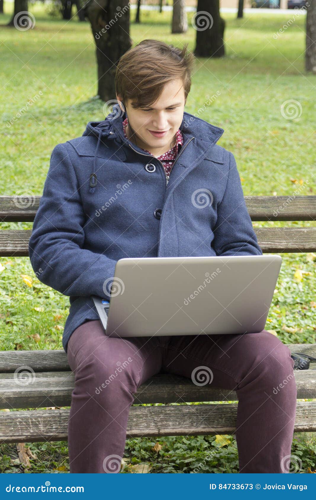 Young Man with Laptop in the Park Stock Image - Image of attractive ...