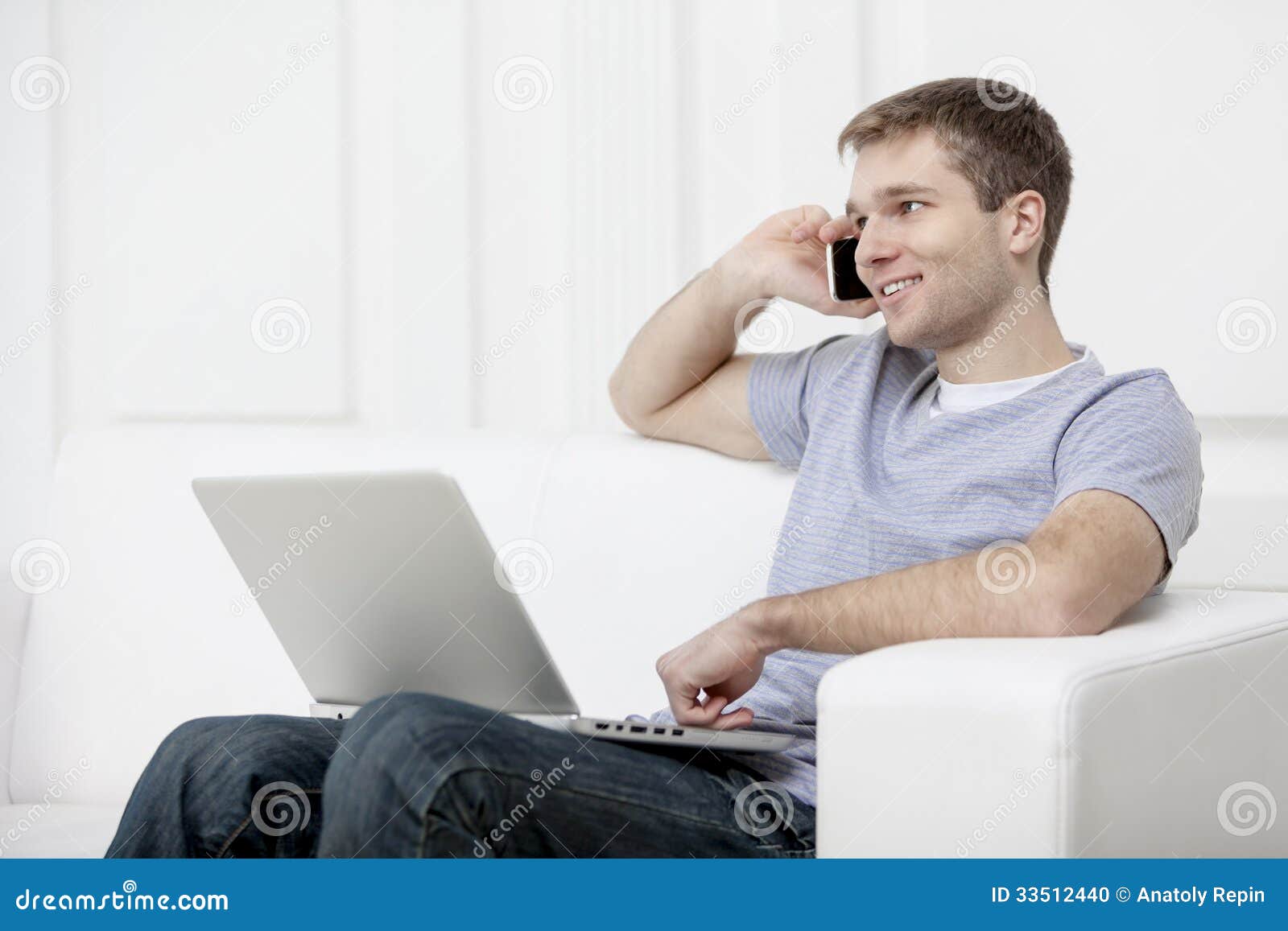 Young Man with Laptop on the Phone Stock Photo - Image of talking ...