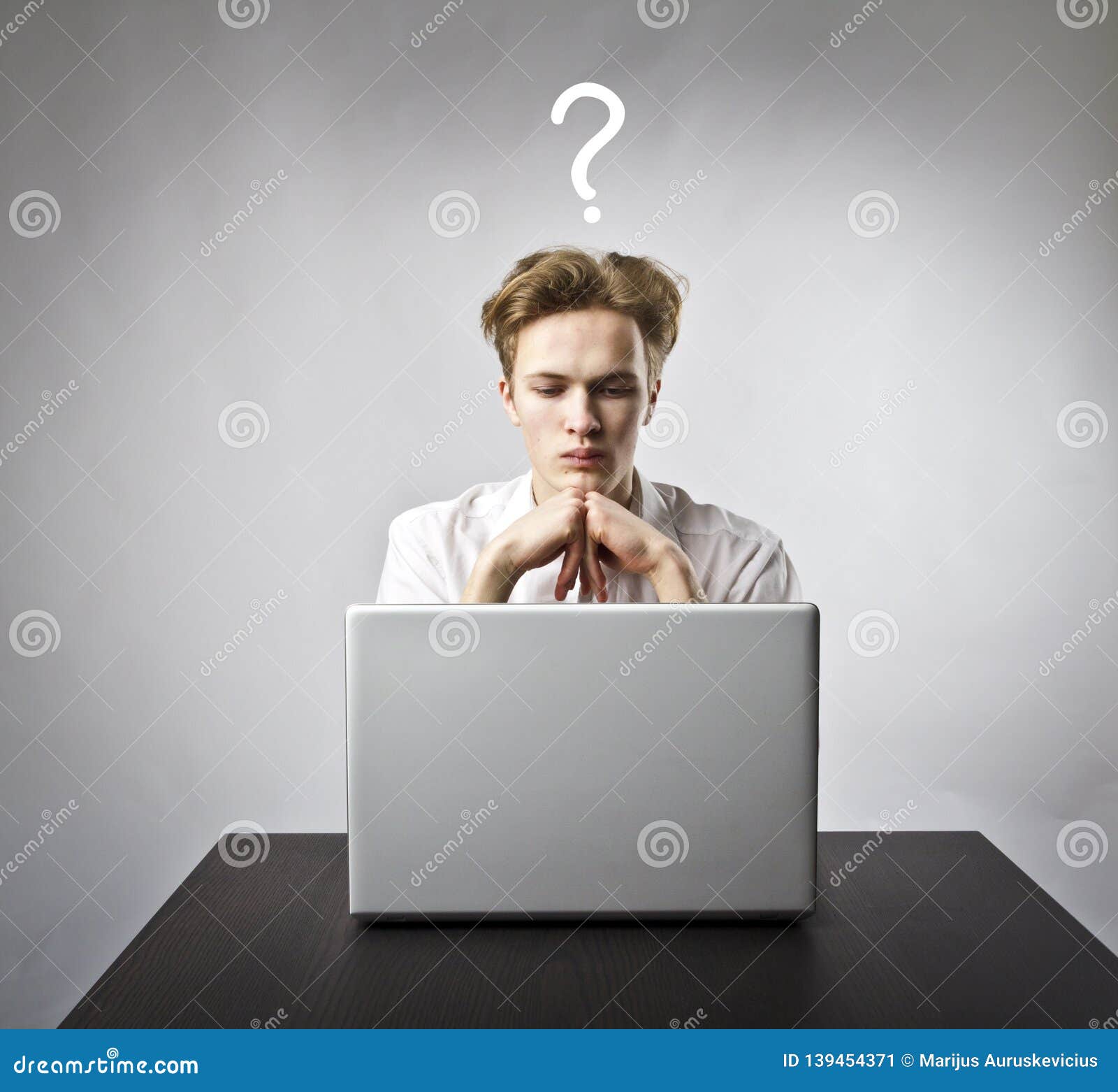 Young Man with Laptop. Question and Ignorance Concept Stock Image ...