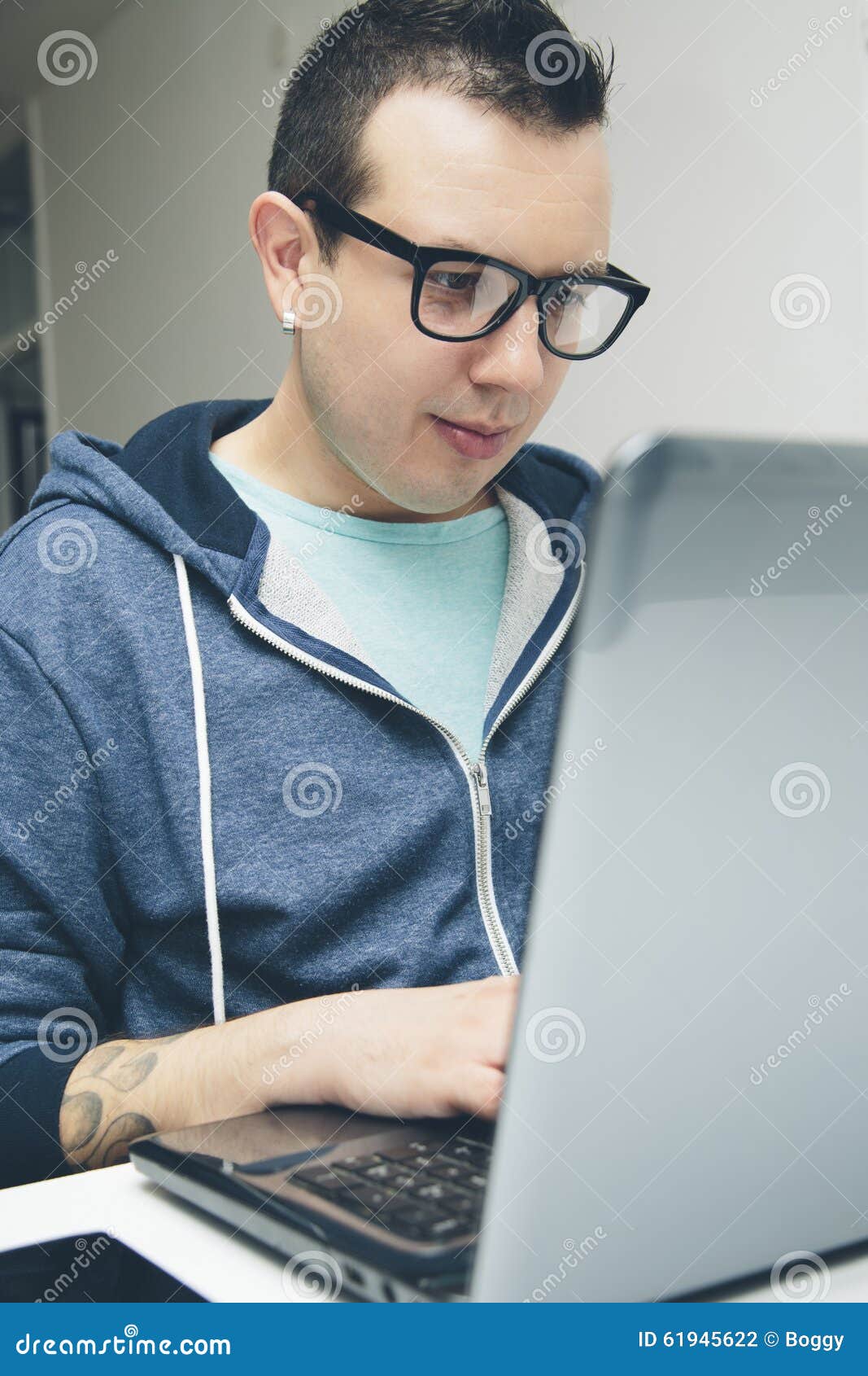 Young man with laptop stock photo. Image of nerd, internet - 61945622