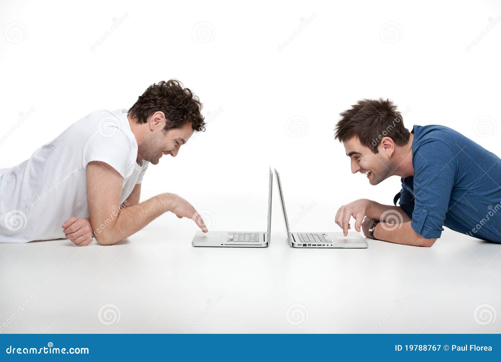 Young Man Laughing in Front of Laptops Stock Image - Image of laptop ...