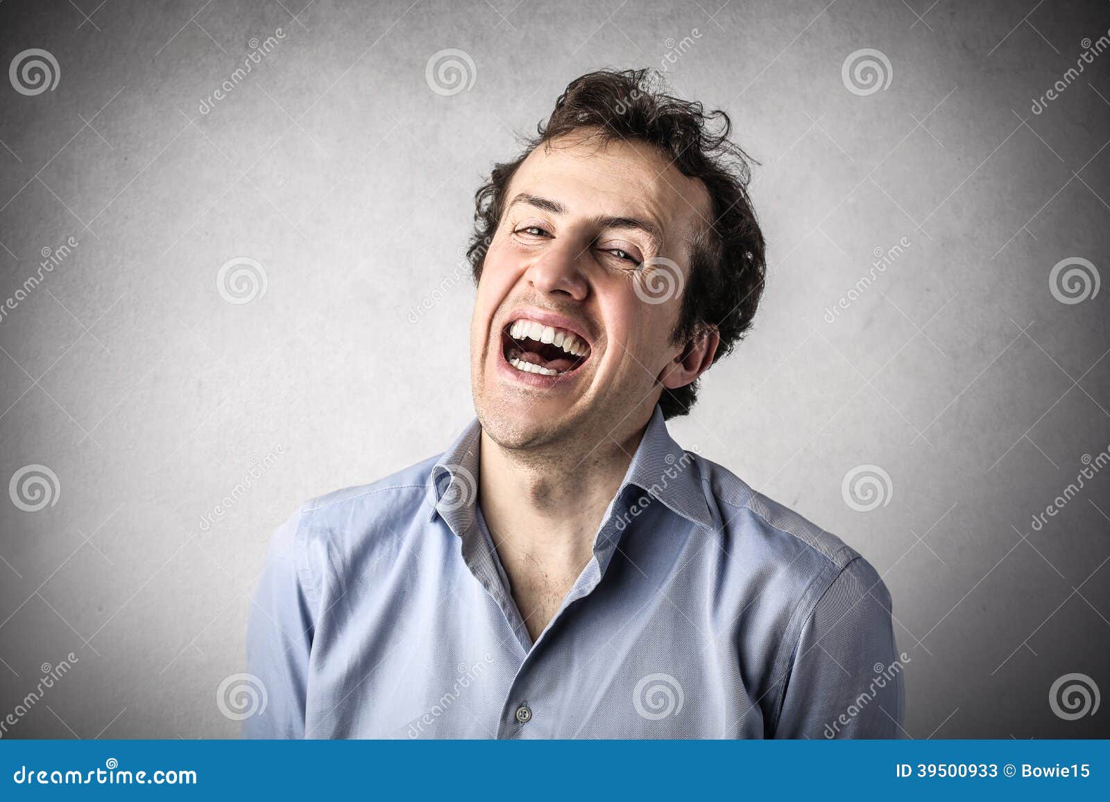 Young man laughing stock image. Image of work, positive - 39500933