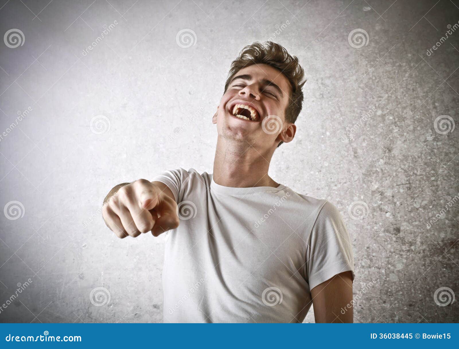 Young man laughing stock image. Image of adolescent, funny - 36038445