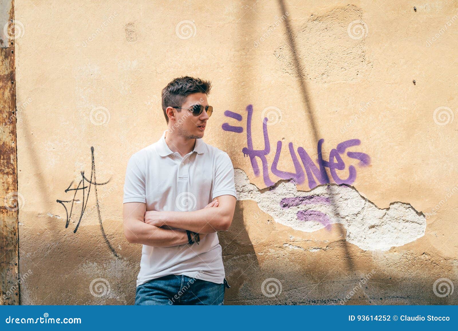 Young Man Leaning Against the Wall Stock Photo - Image of leaning ...