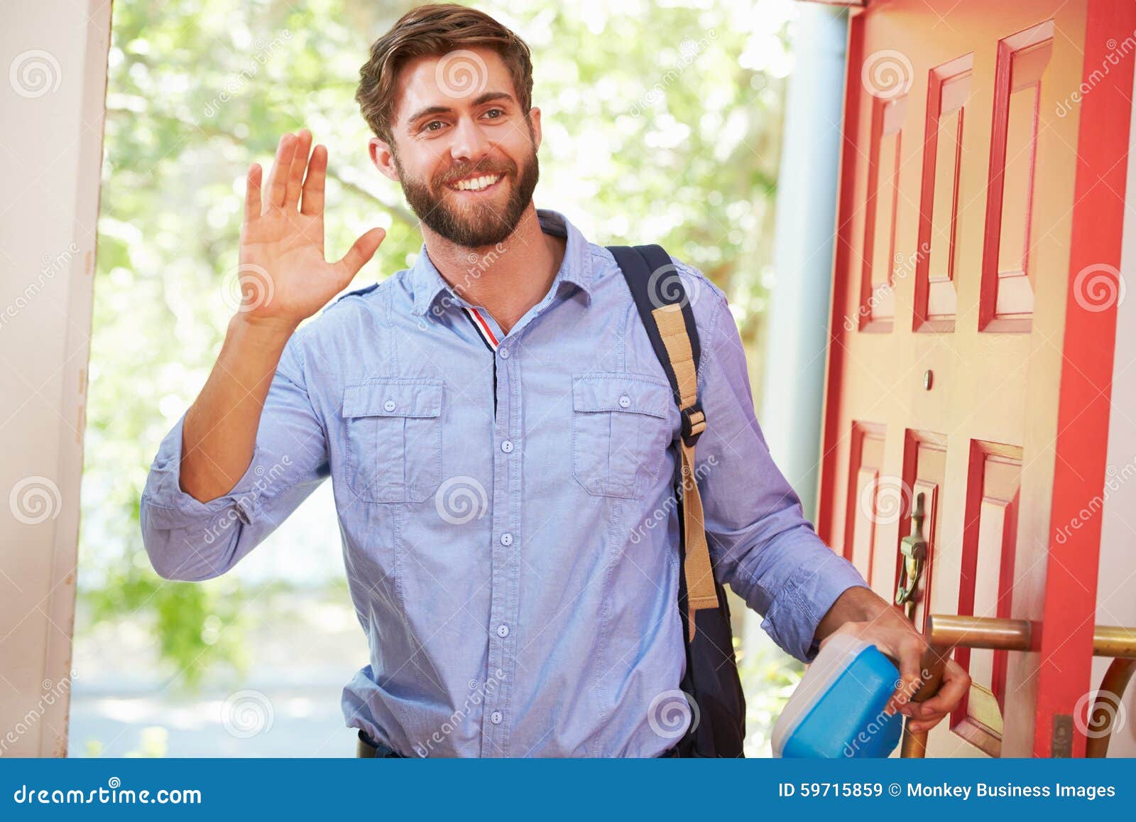 Young Man Leaving Home for Work with Packed Lunch Stock Image - Image ...