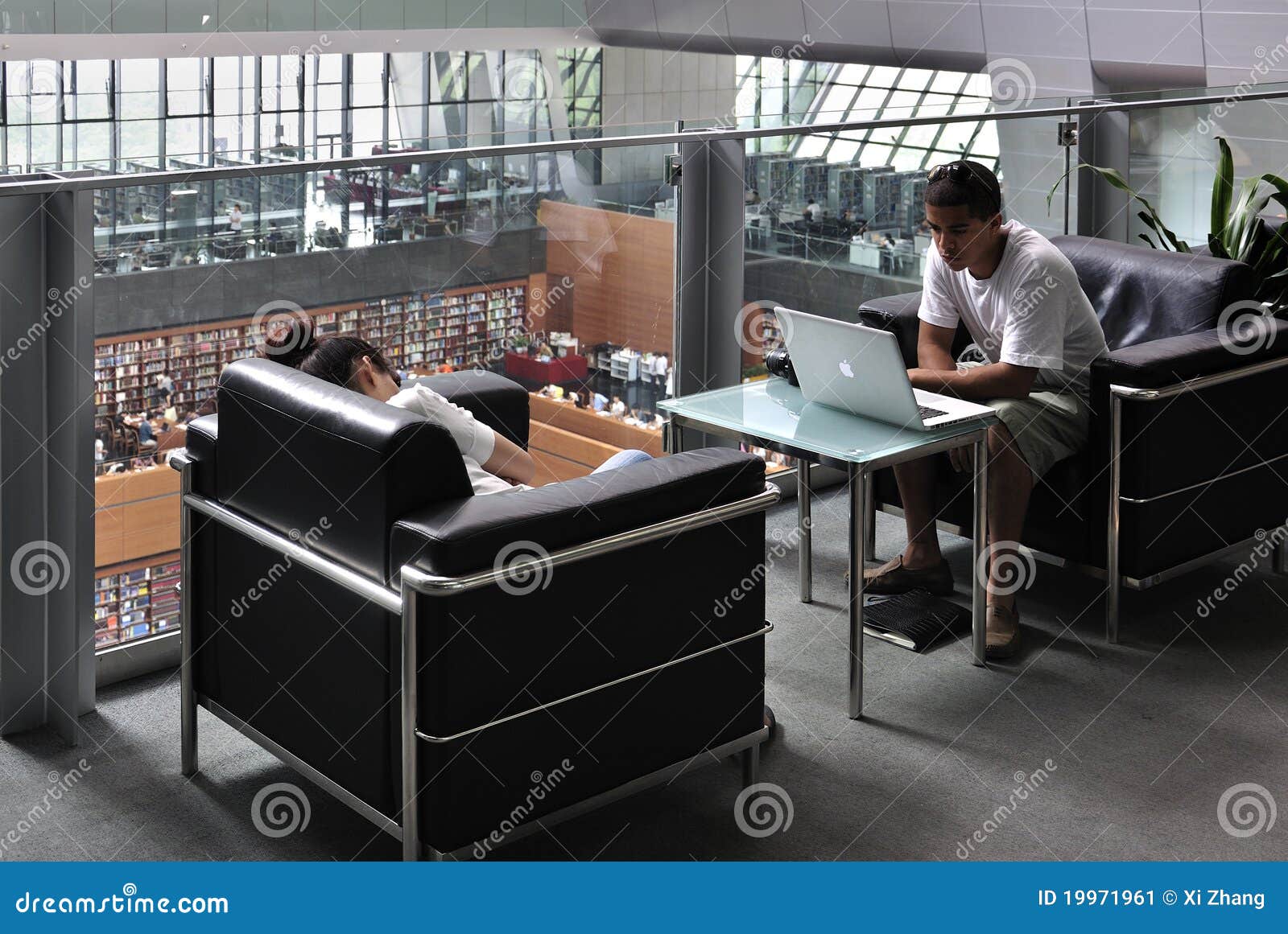 Young man in Library editorial photo. Image of readers - 19971961