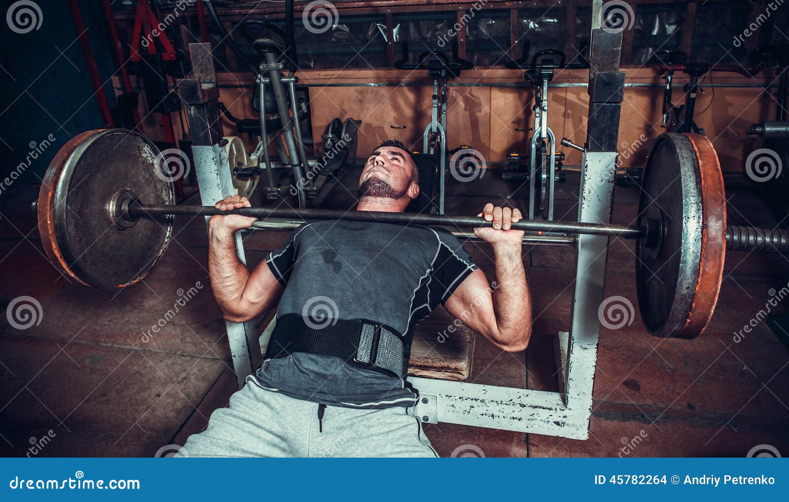 Young Man Lifting the Barbell Stock Photo - Image of exercise ...