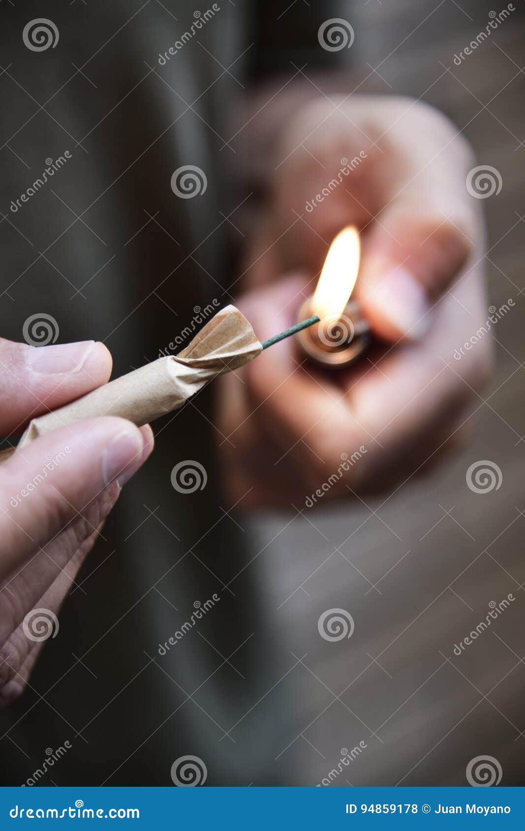 Young Man Lighting a Firecracker Stock Photo - Image of holiday ...