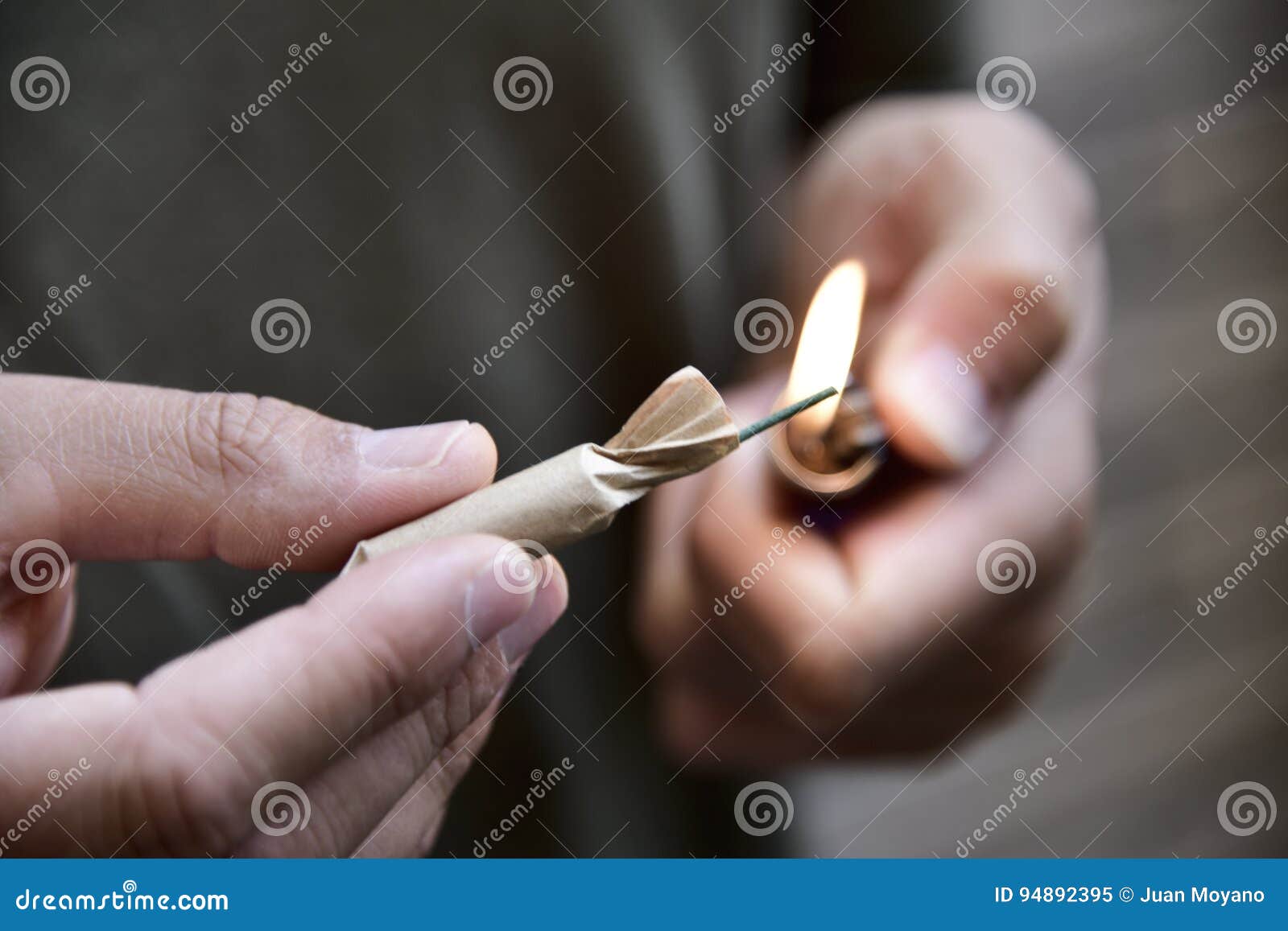 Young Man Lighting a Firecracker Stock Image - Image of johns ...