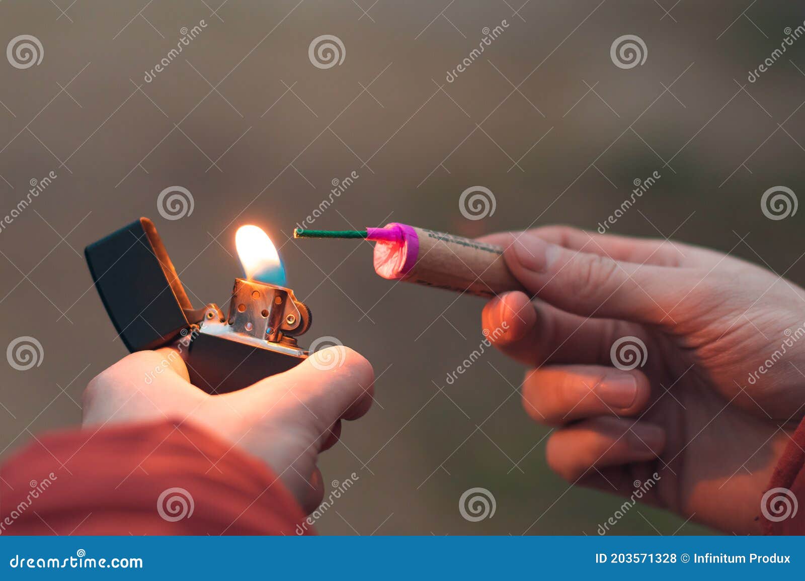 Young Man Lighting Up Firecracker in His Hand Stock Photo - Image of ...