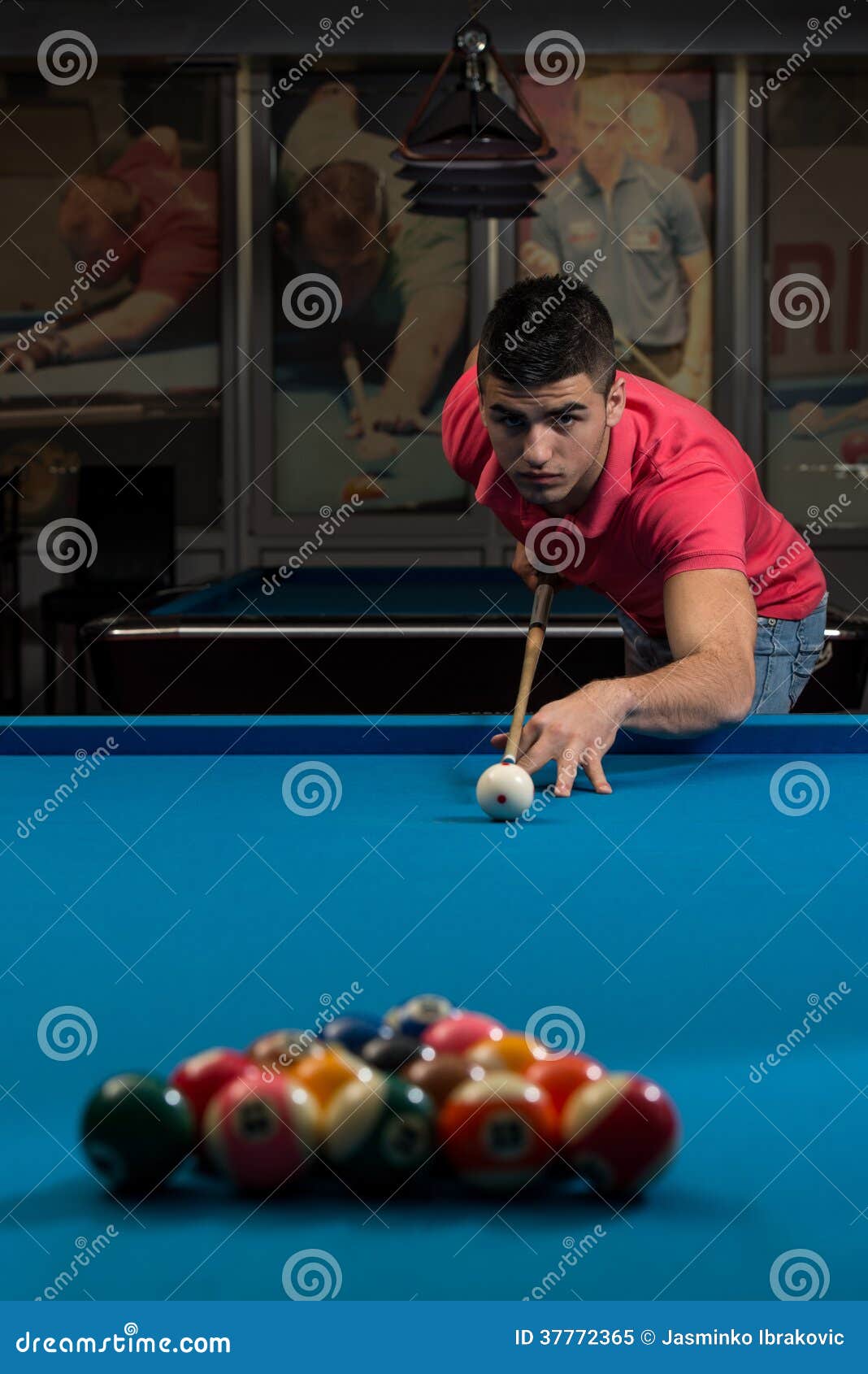 Young Man Lining To Hit Ball on Pool Table Stock Image - Image of ...