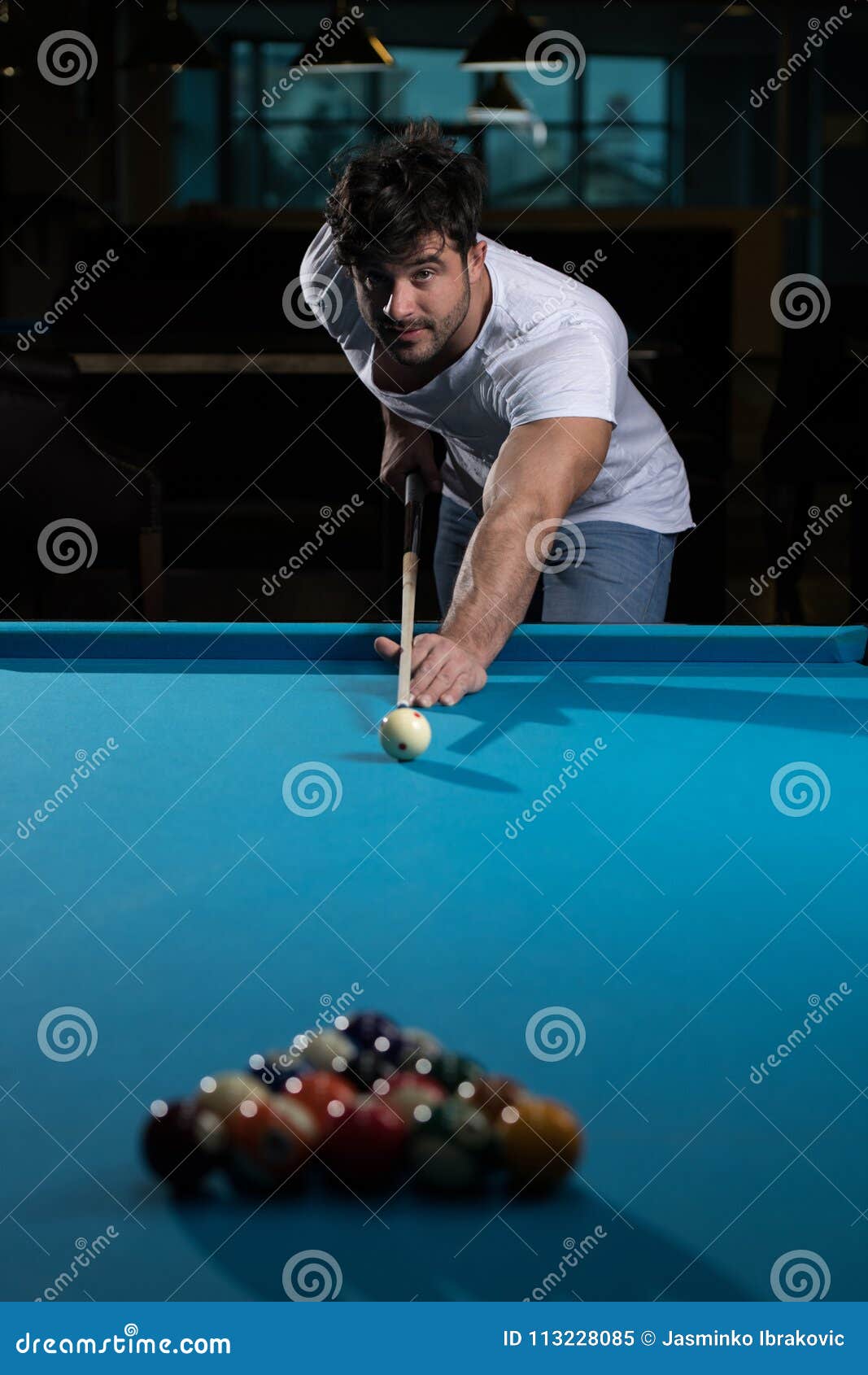 Man Lining To Hit Ball on Pool Table Stock Image - Image of male ...