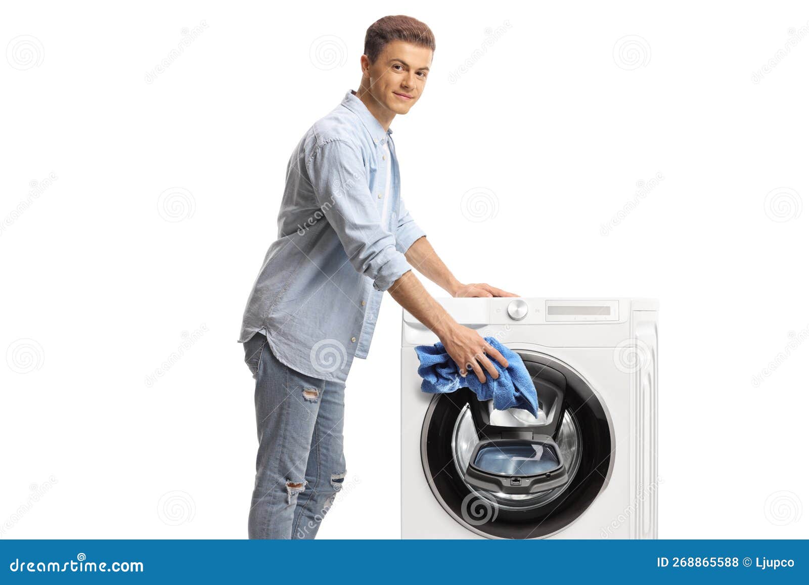 Young Man Loading a Washing Machine Stock Photo - Image of housekeeping ...