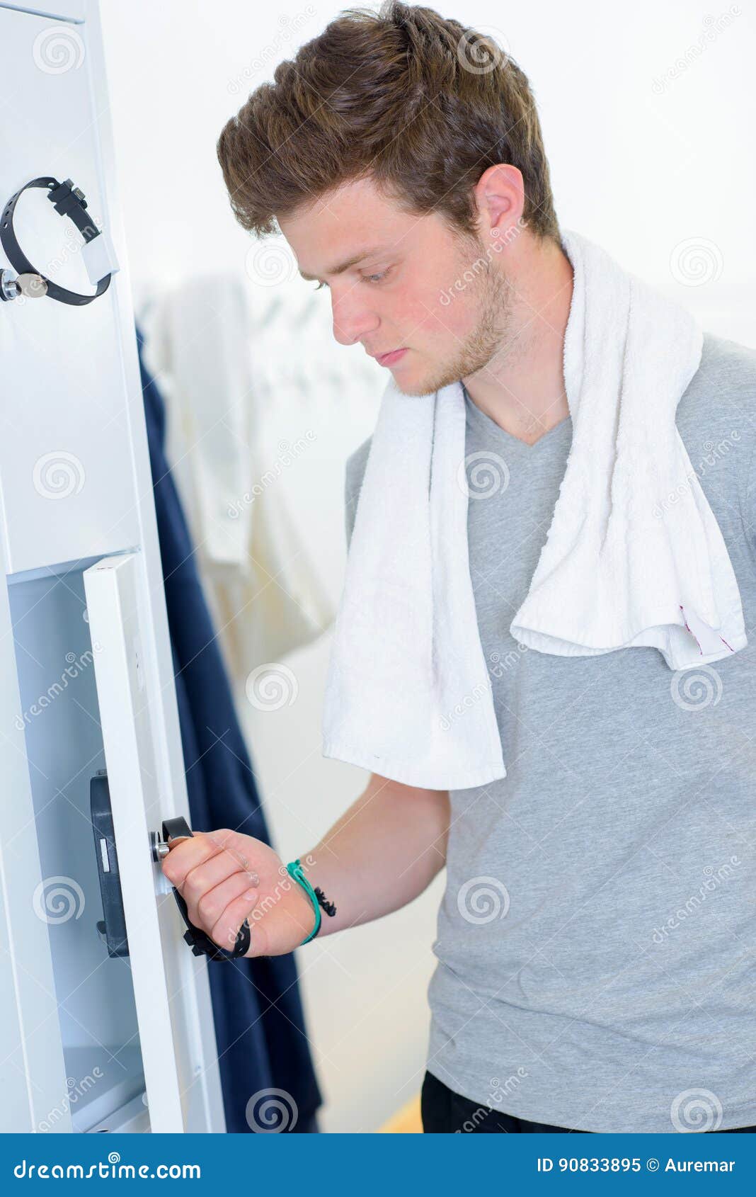 Young man in locker room stock image. Image of player - 90833895