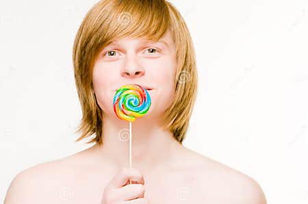 Young man with lollipop stock photo. Image of junk, face - 9227106