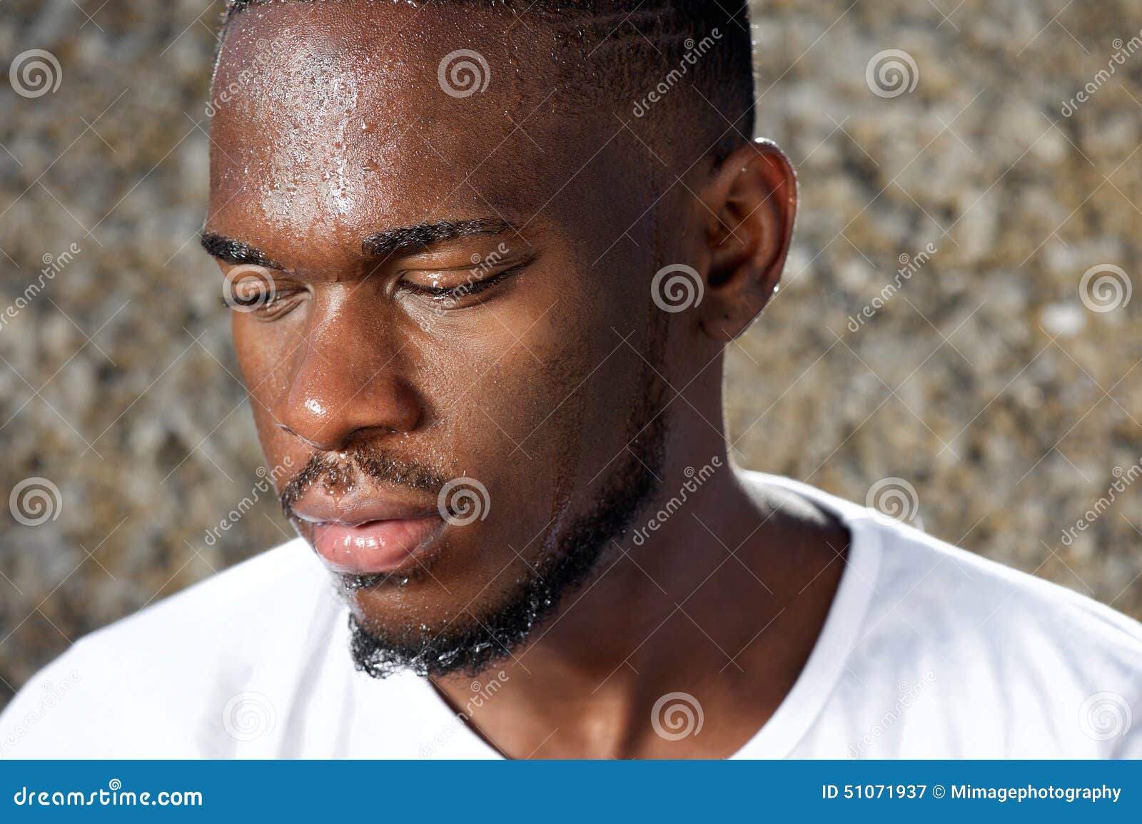 Young Man Looking Away with Sweat Dripping Down Face Stock Image ...