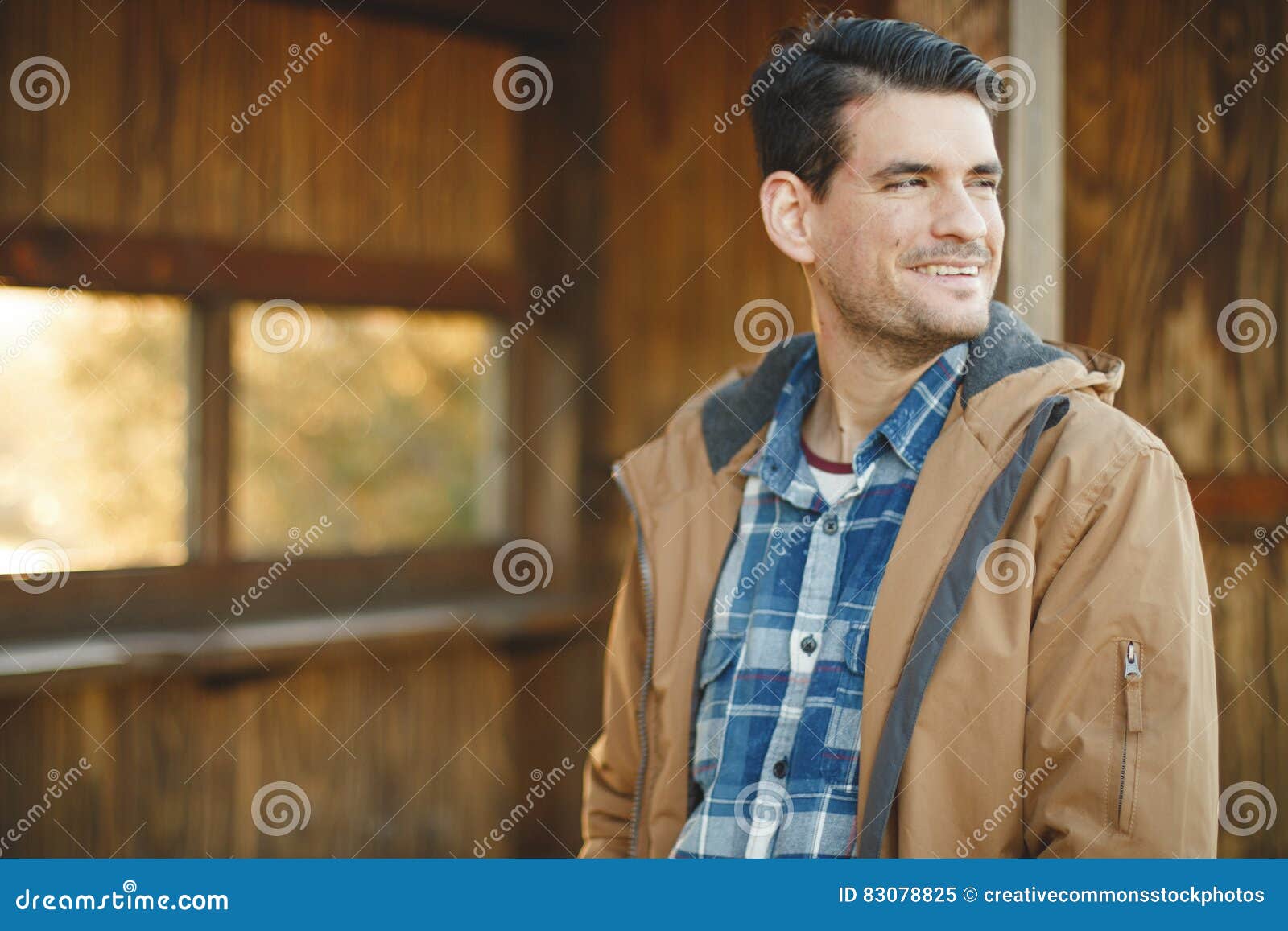 Young Man Looking Back With A Smile Picture. Image: 83078825