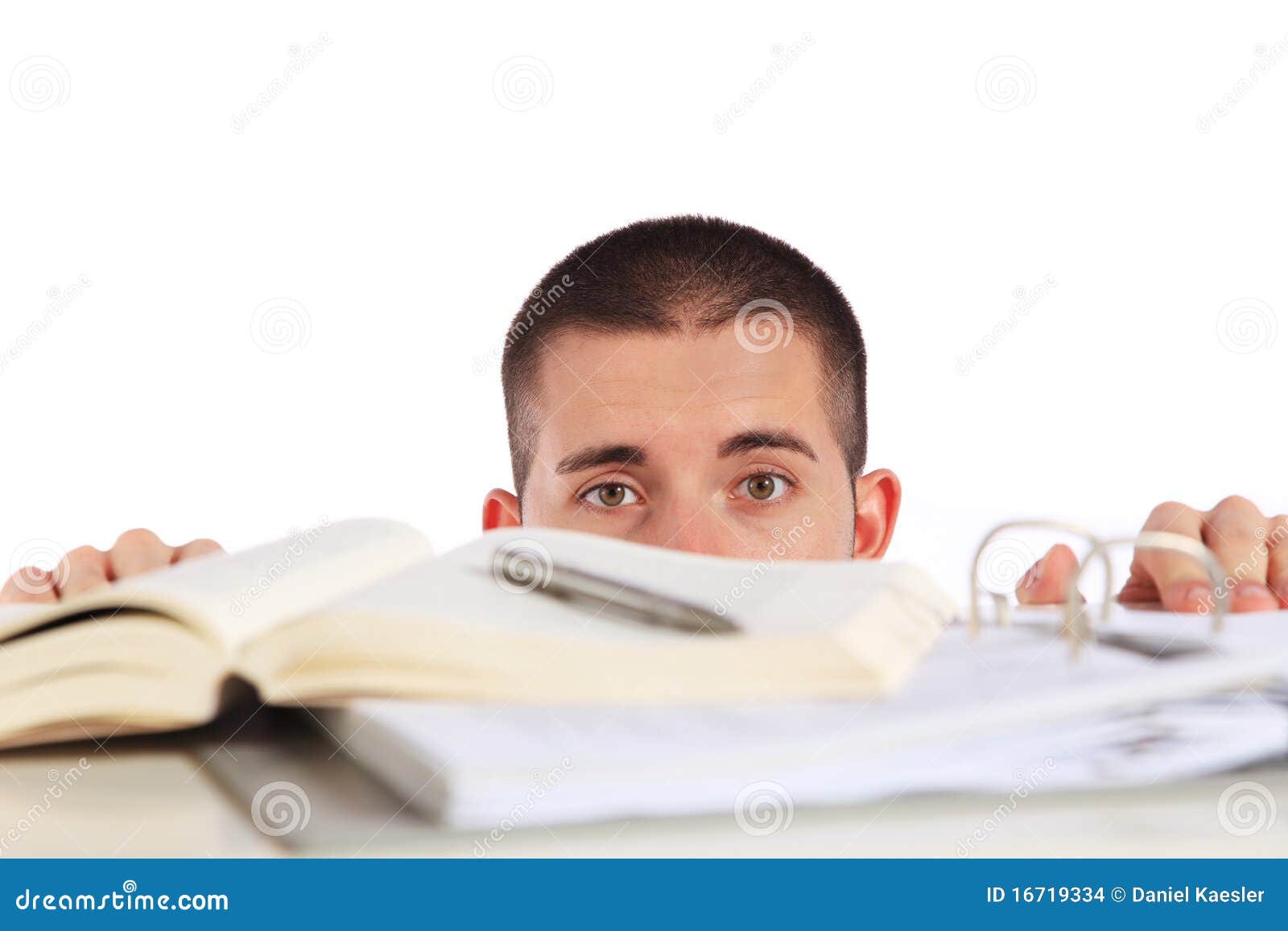 Young Man Looking Behind His Study Documents Stock Photo - Image of ...