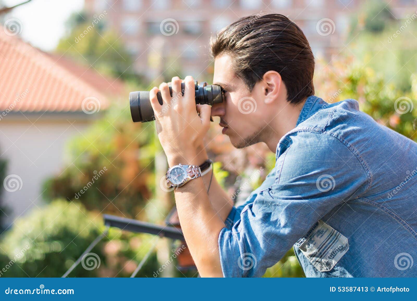 Young Man Looking through Binocular Searching Stock Image - Image of ...