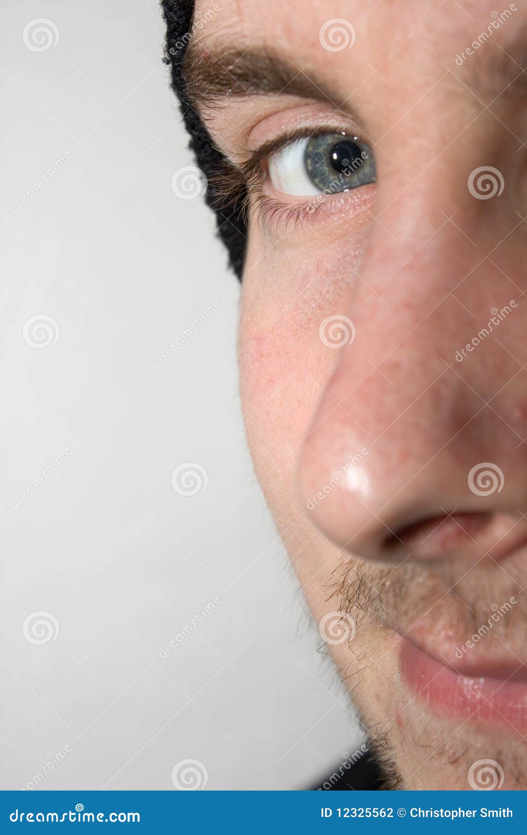 Young Man Looking at Camera Stock Photo - Image of adult, focus: 12325562