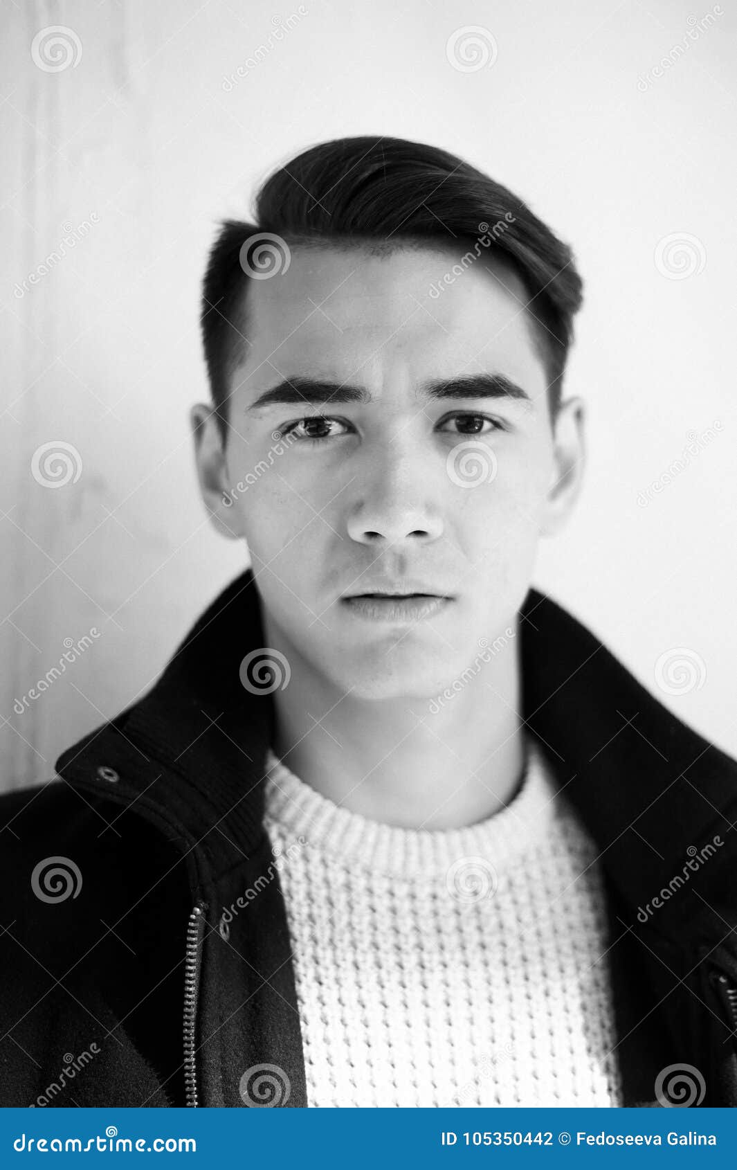 Young Man Looking into the Camera ,open Look. . Model Posing Stock ...