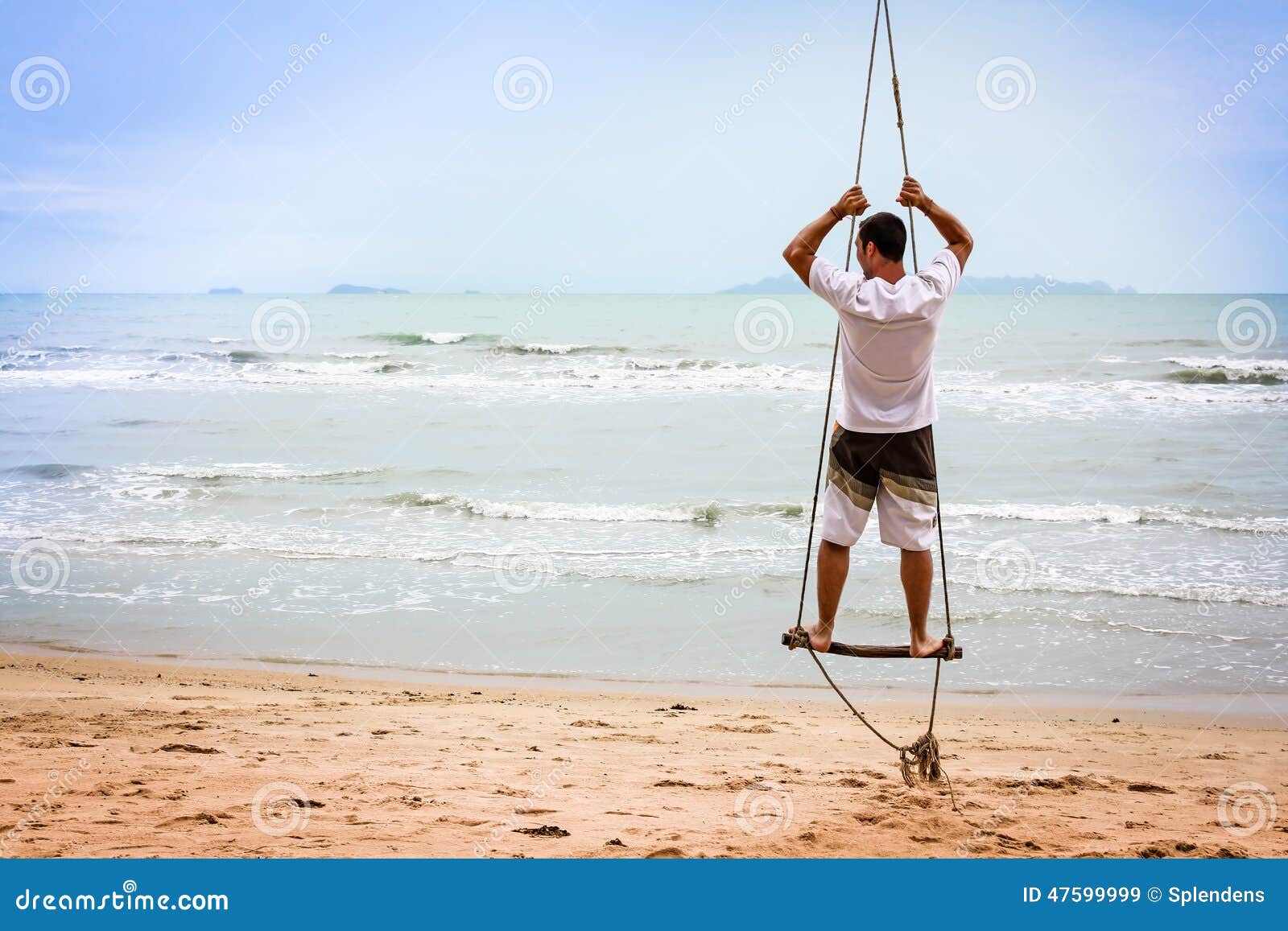 Young Man Looking into the Distance on the Beach Stock Image - Image of ...