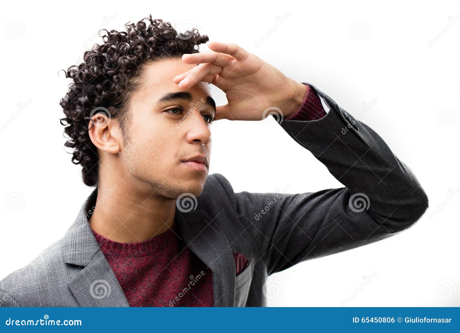 Young man looking far away stock photo. Image of curly - 65450806