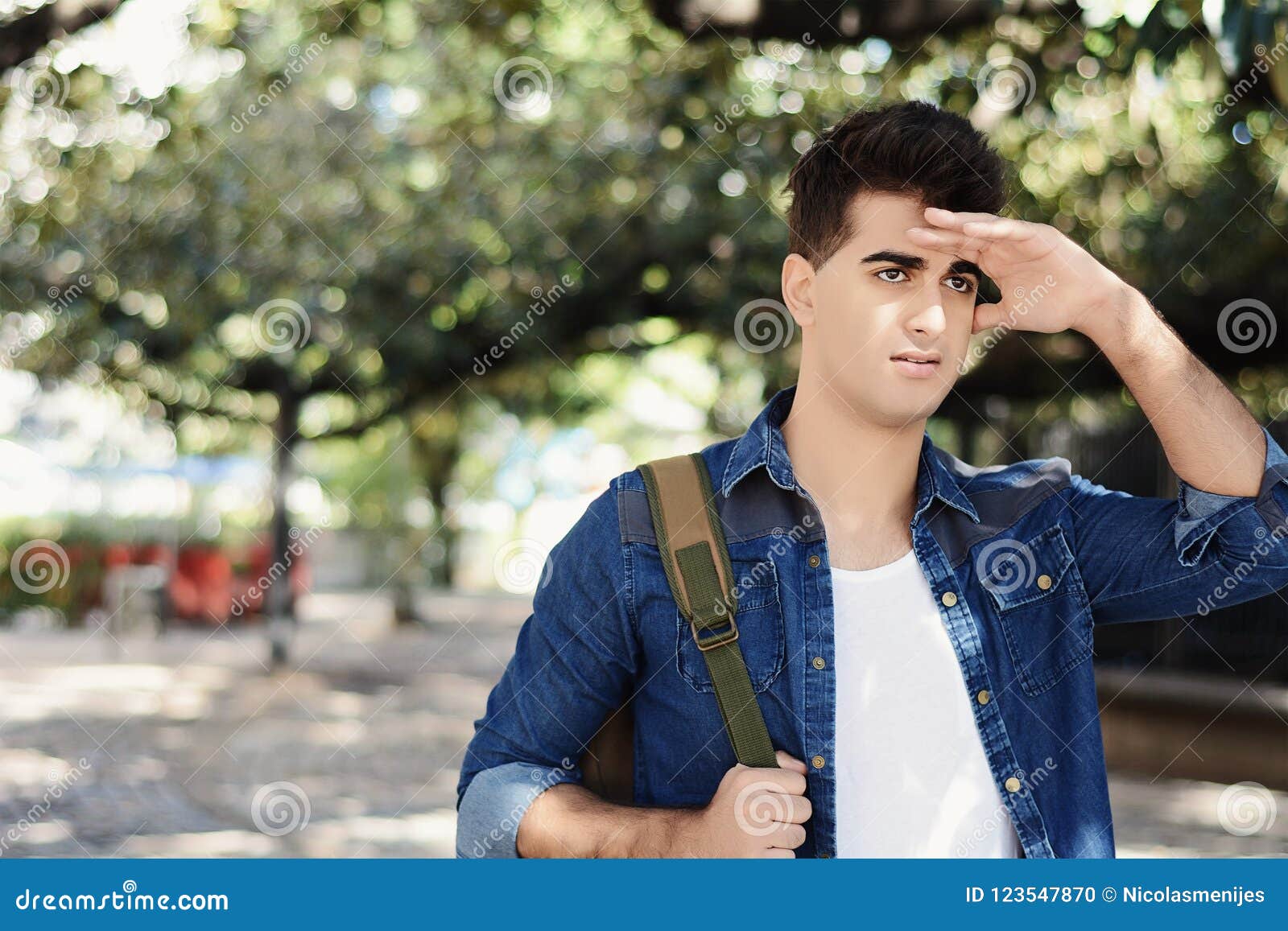 Young man looking far away stock photo. Image of eastern - 123547870