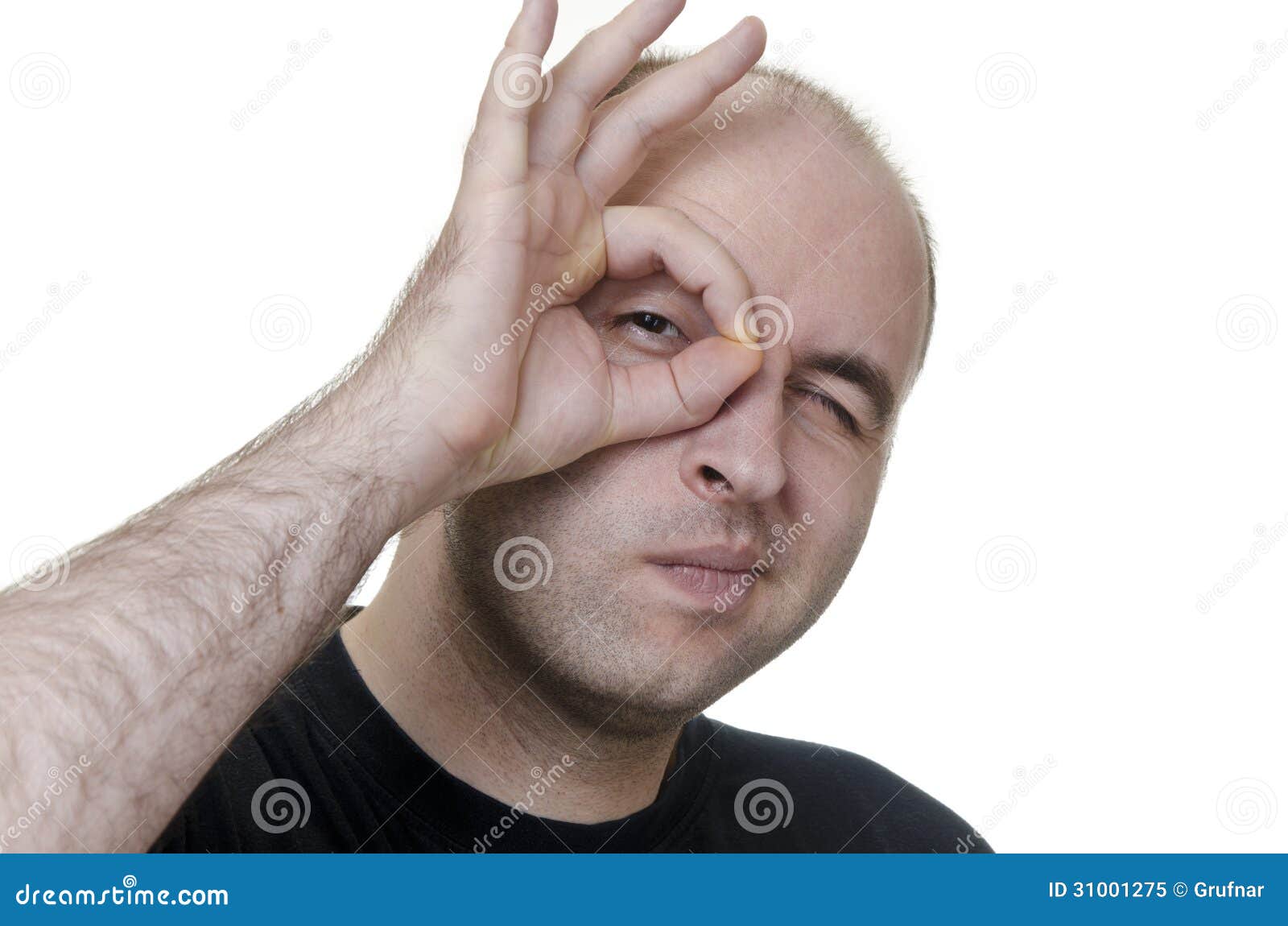 Young Man Looking through Fingers on White Background Stock Image ...