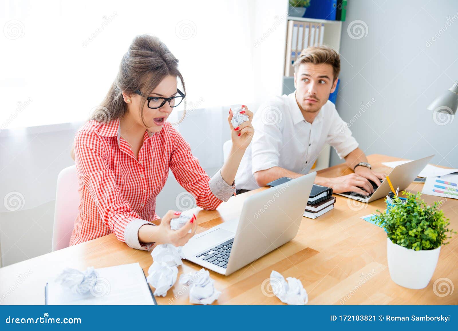 Young Man Looking at His Overworked Angry Partner with Problems Stock ...