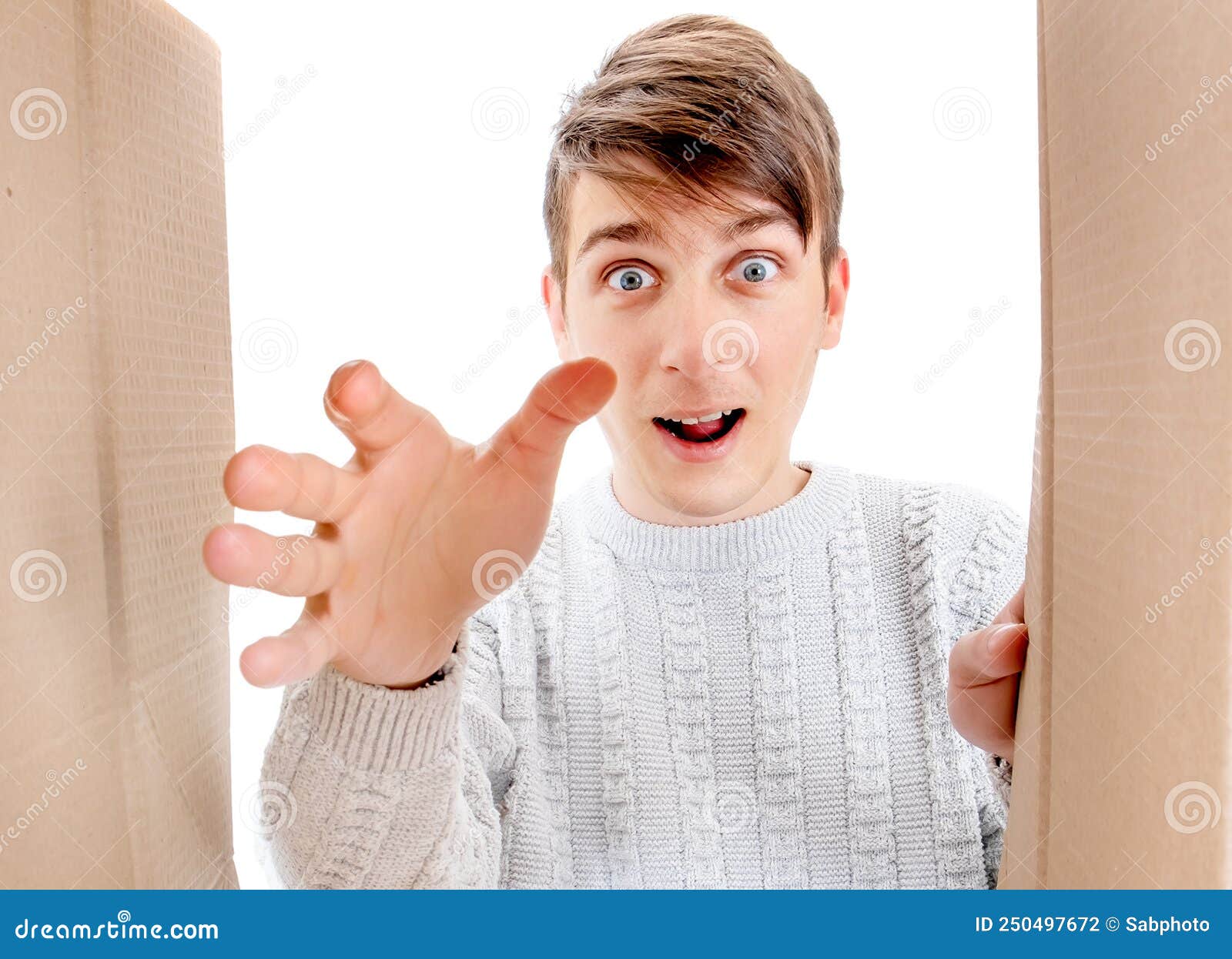 Young Man Looking Inside a Box Stock Photo - Image of postal, joyful ...
