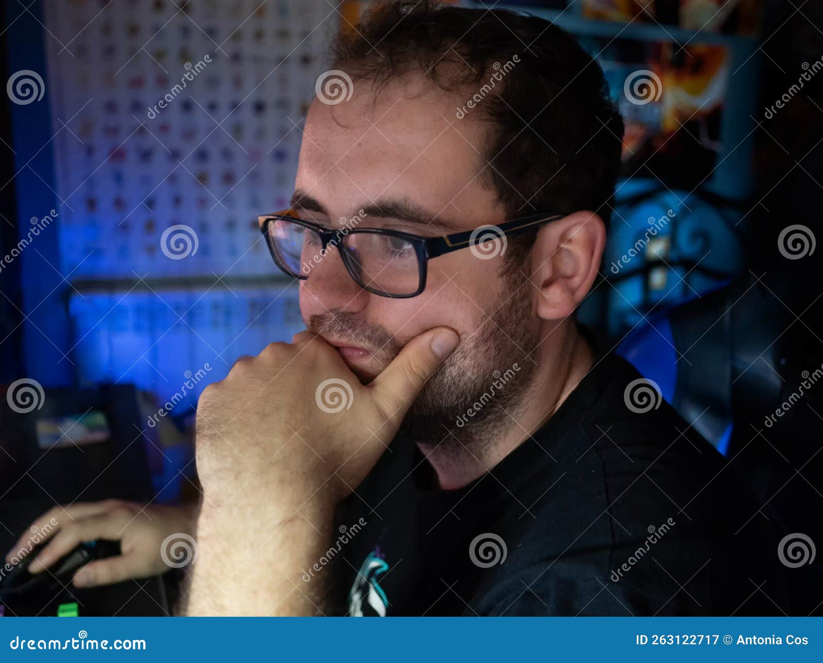 Young Man Looking Intently at the Computer in a Pensive Attitude Stock ...