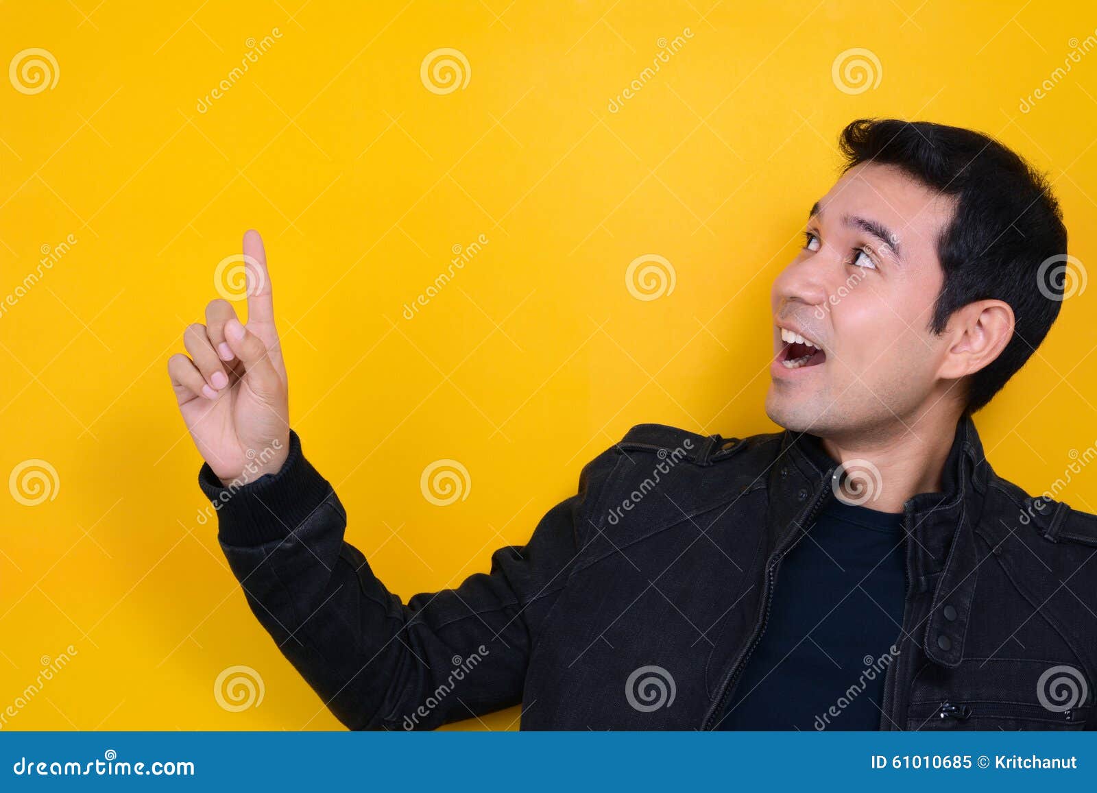 Young Man Looking And Pointing At Empty Space With Surprised Face Stock ...