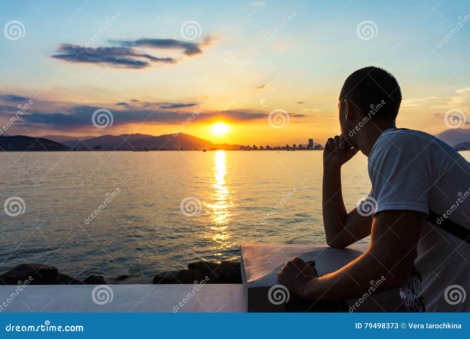 Young Man is Looking at the Sunrise Stock Image - Image of silence ...