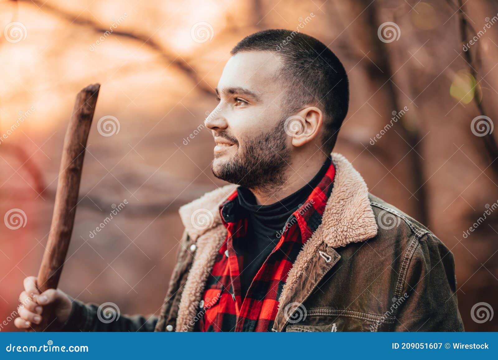 Young Man Looking at the Sunrise on a Mountain Top. Stock Image - Image ...