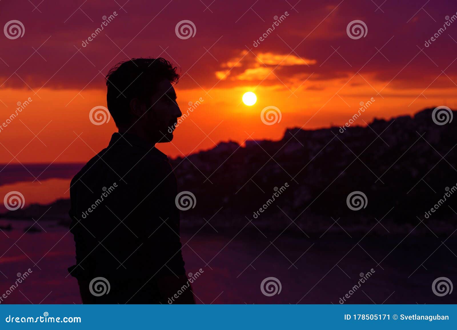 Young Man is Looking at the Sunset Thinking Stock Image - Image of ...