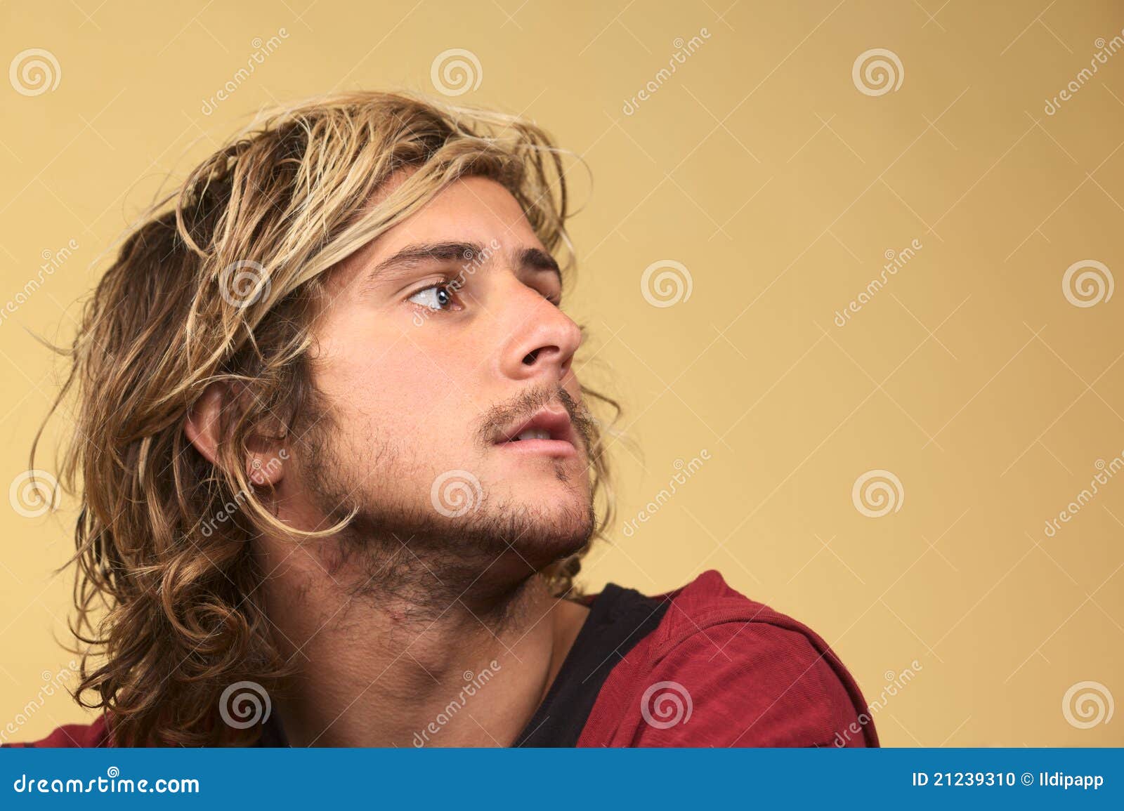 Young Man Looking To the Side Stock Photo - Image of attentive, looking ...