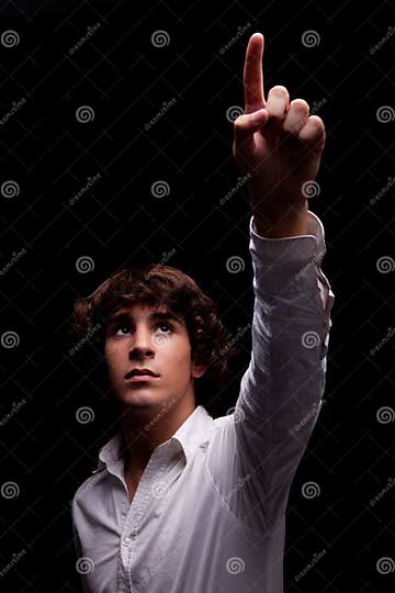 Young Man Looking Up To the Light and Pointing Stock Photo - Image of ...