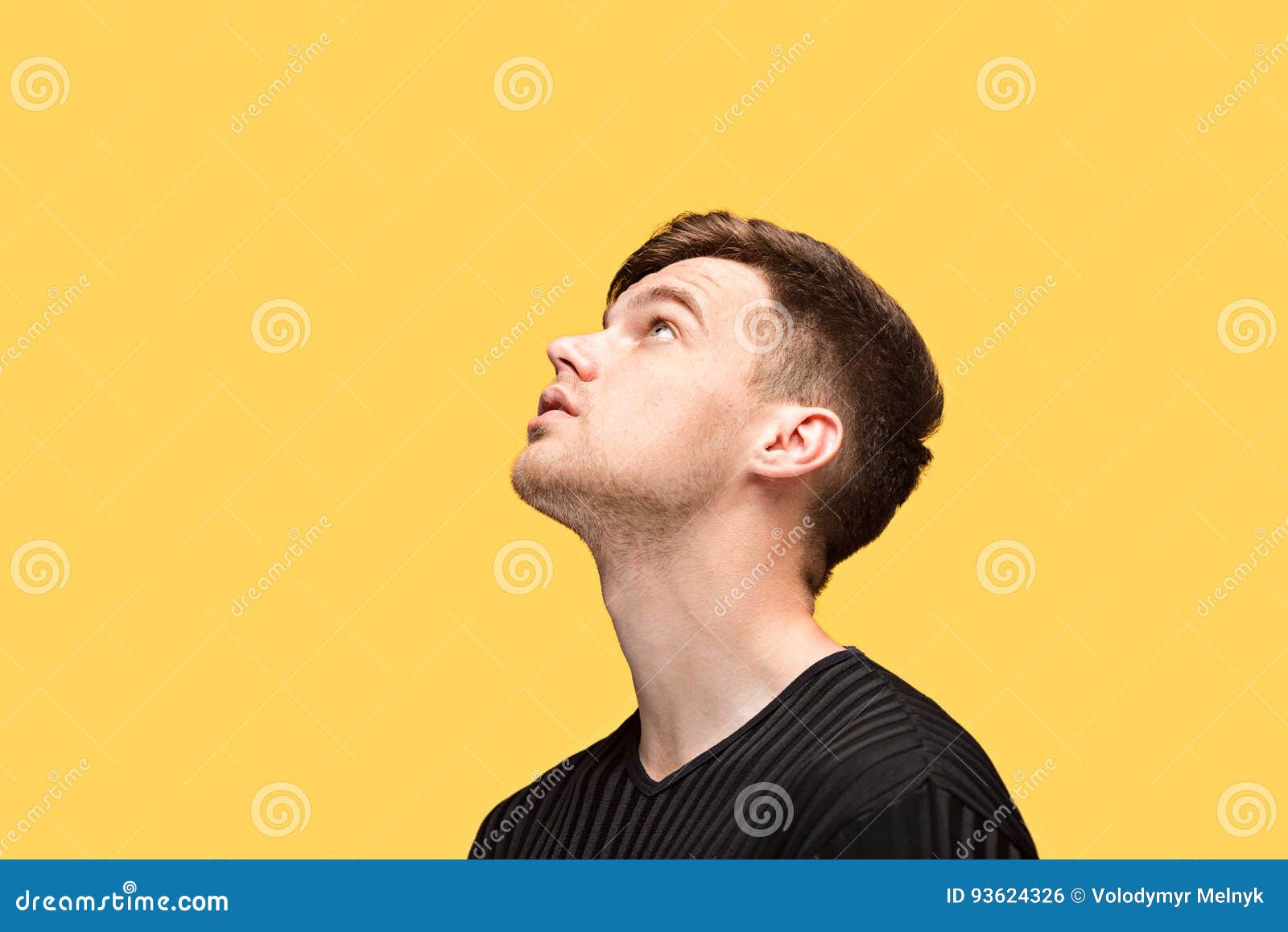 The young man looking up stock photo. Image of looking - 93624326